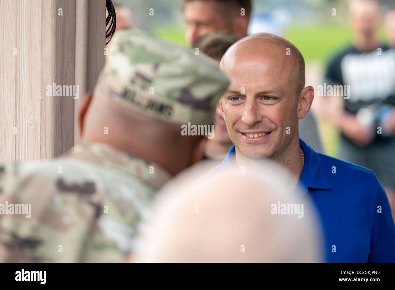 U.S. Army Staff Sgt. Casey Buckley, Vermont National Guard, accepts a ...