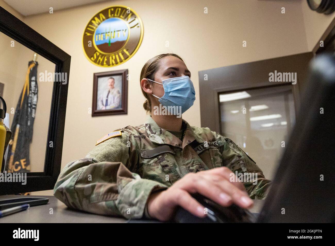 A Soldier assigned to Task Force Badge assist Yuma County Sheriffs ...