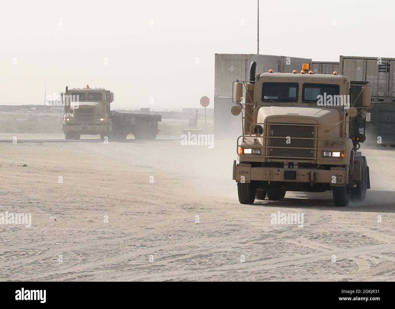 Tractor-trailer trucks driven by National Guardsmen, deployed to Kuwait ...