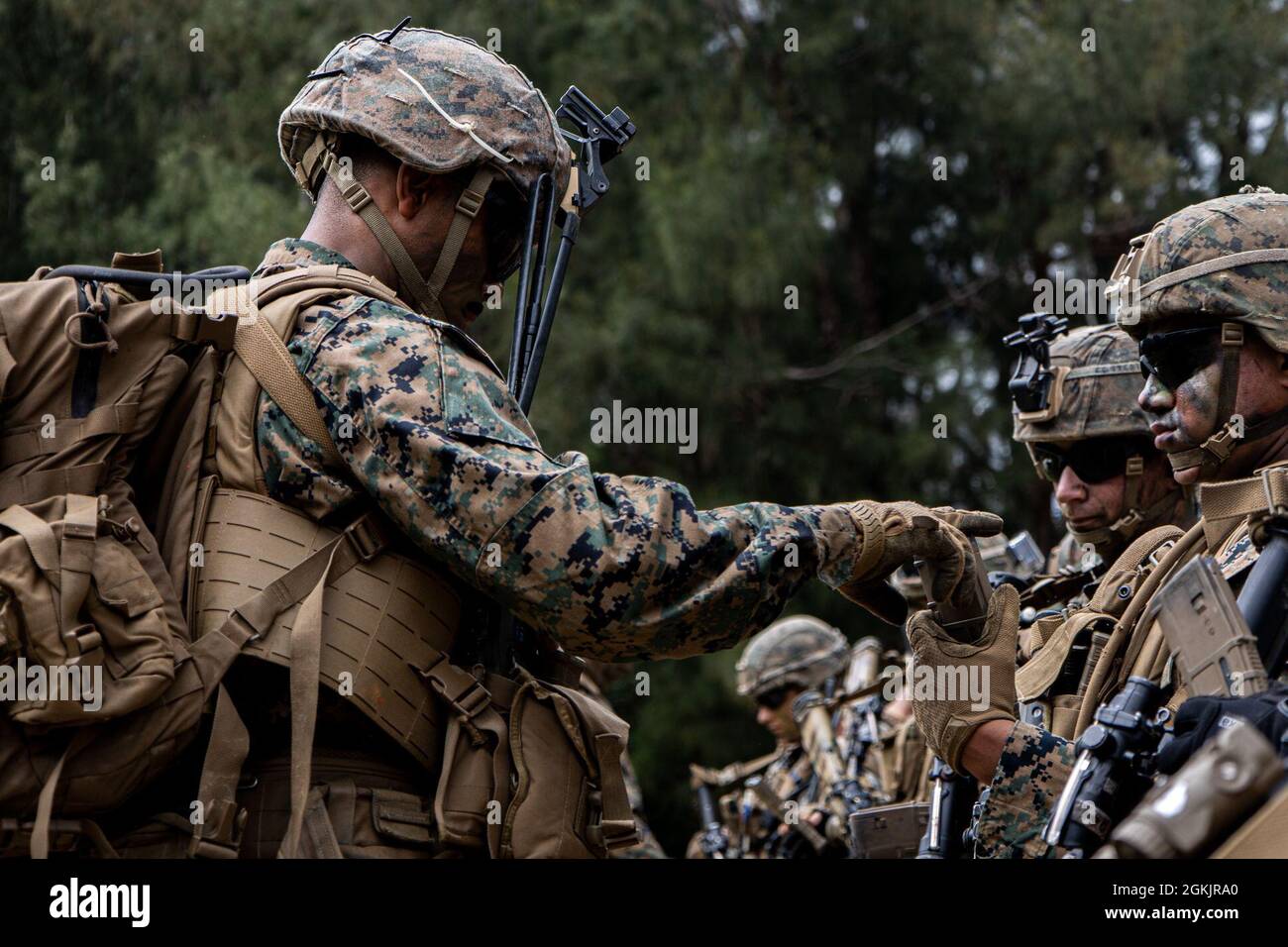 U.S. Marines with 2d Battalion, 2d Marines, conduct pre-combat checks ...