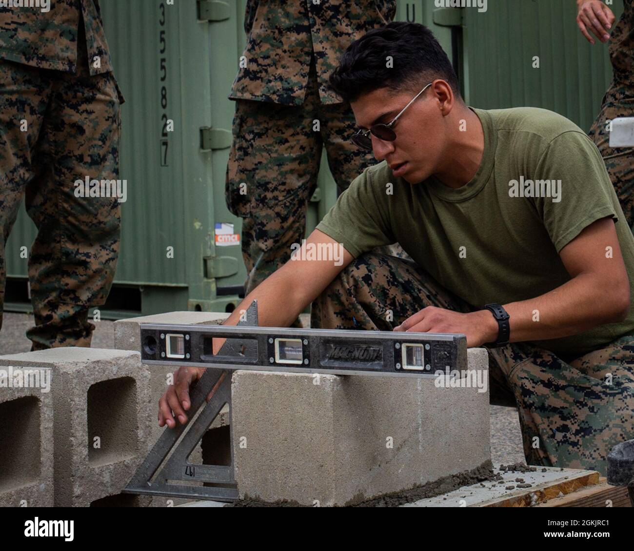 U.S. Marine Corps Cpl. Adam Vega, a combat engineer with Task Force Koa ...
