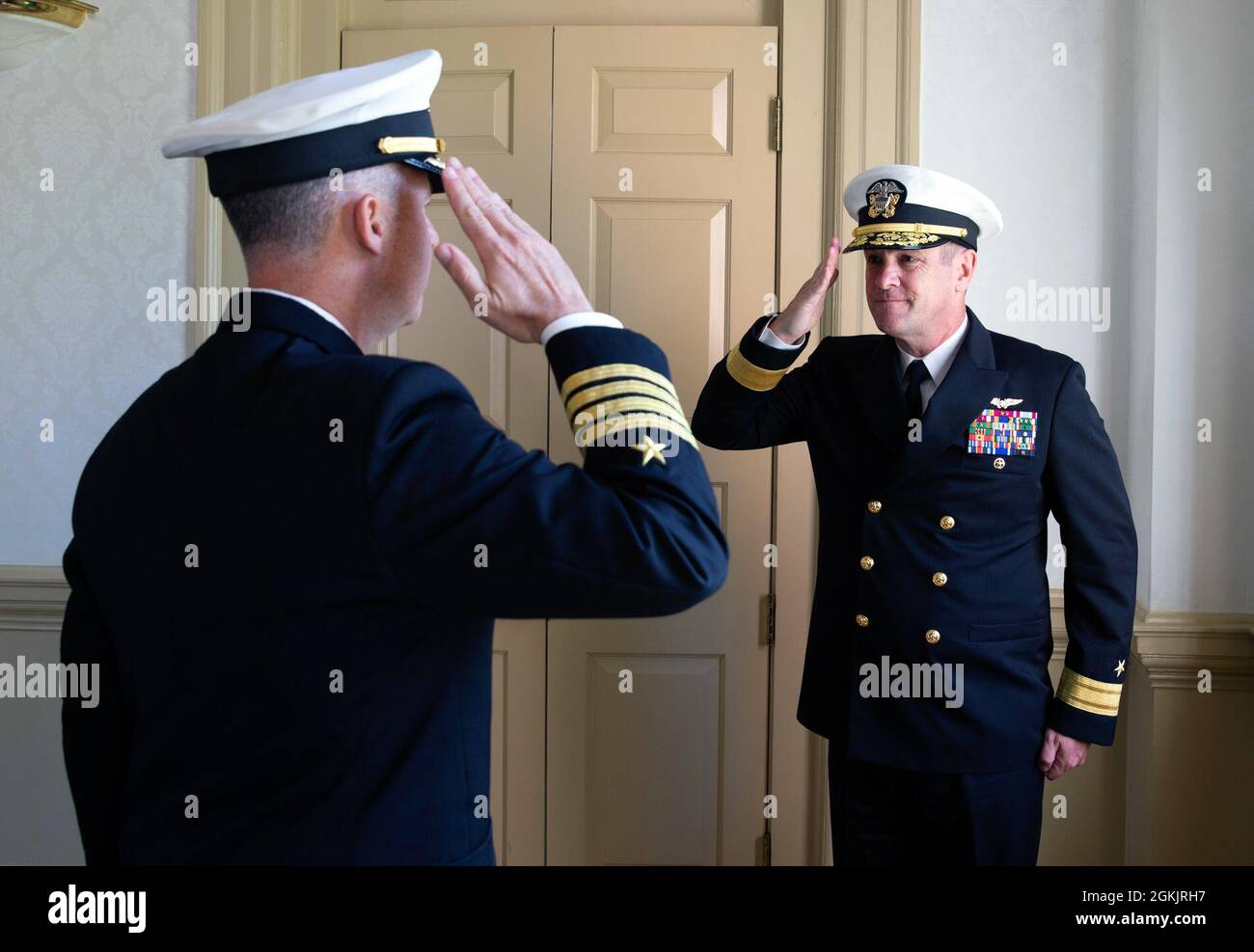 Rear Adm. Craig Clapperton, right, commander, Carrier Strike Group 12 ...