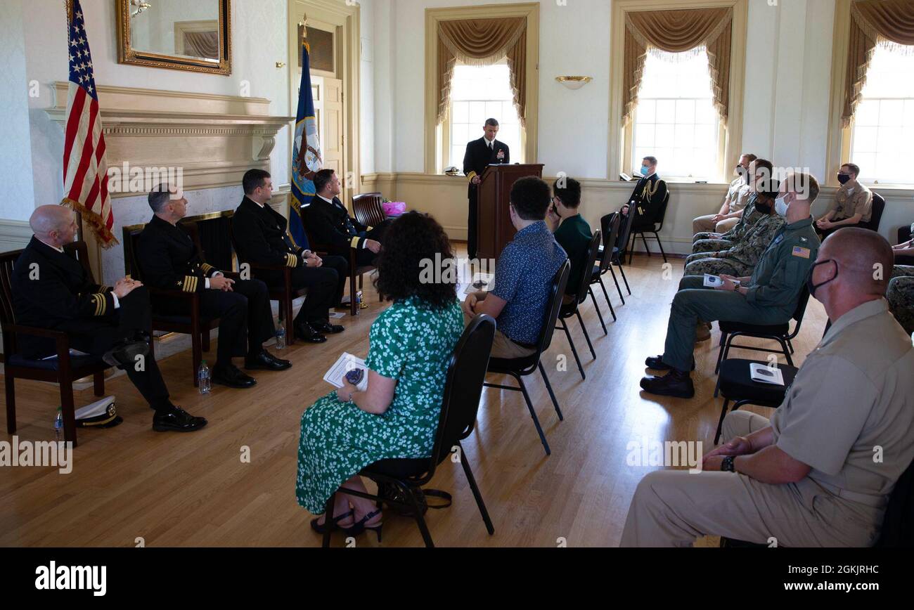 Vice Adm. Andrew Lewis, center, commander, Second Fleet, delivers ...