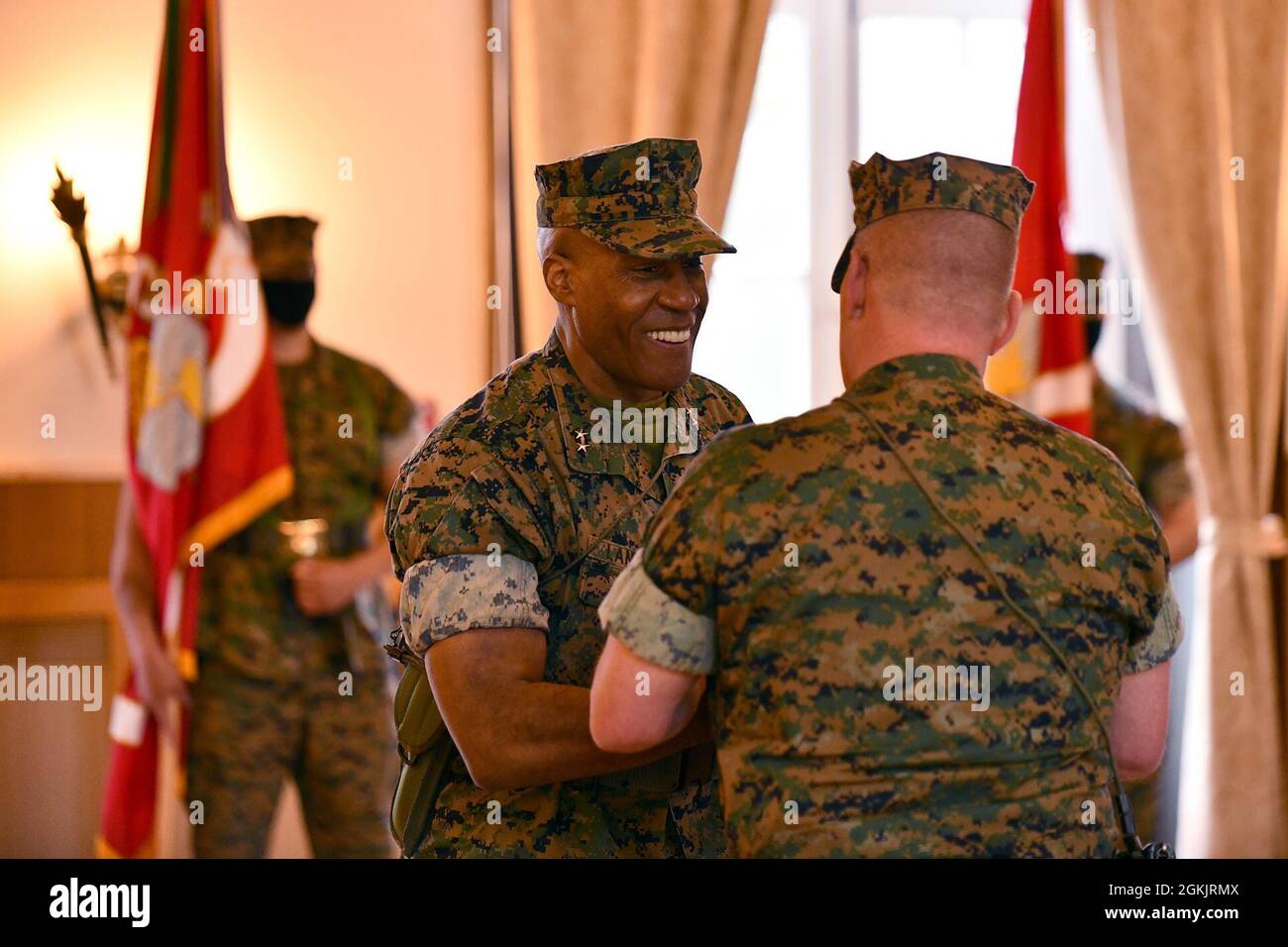 U.S. Marine Corps Maj. Gen. Michael E. Langley, the outgoing commander ...