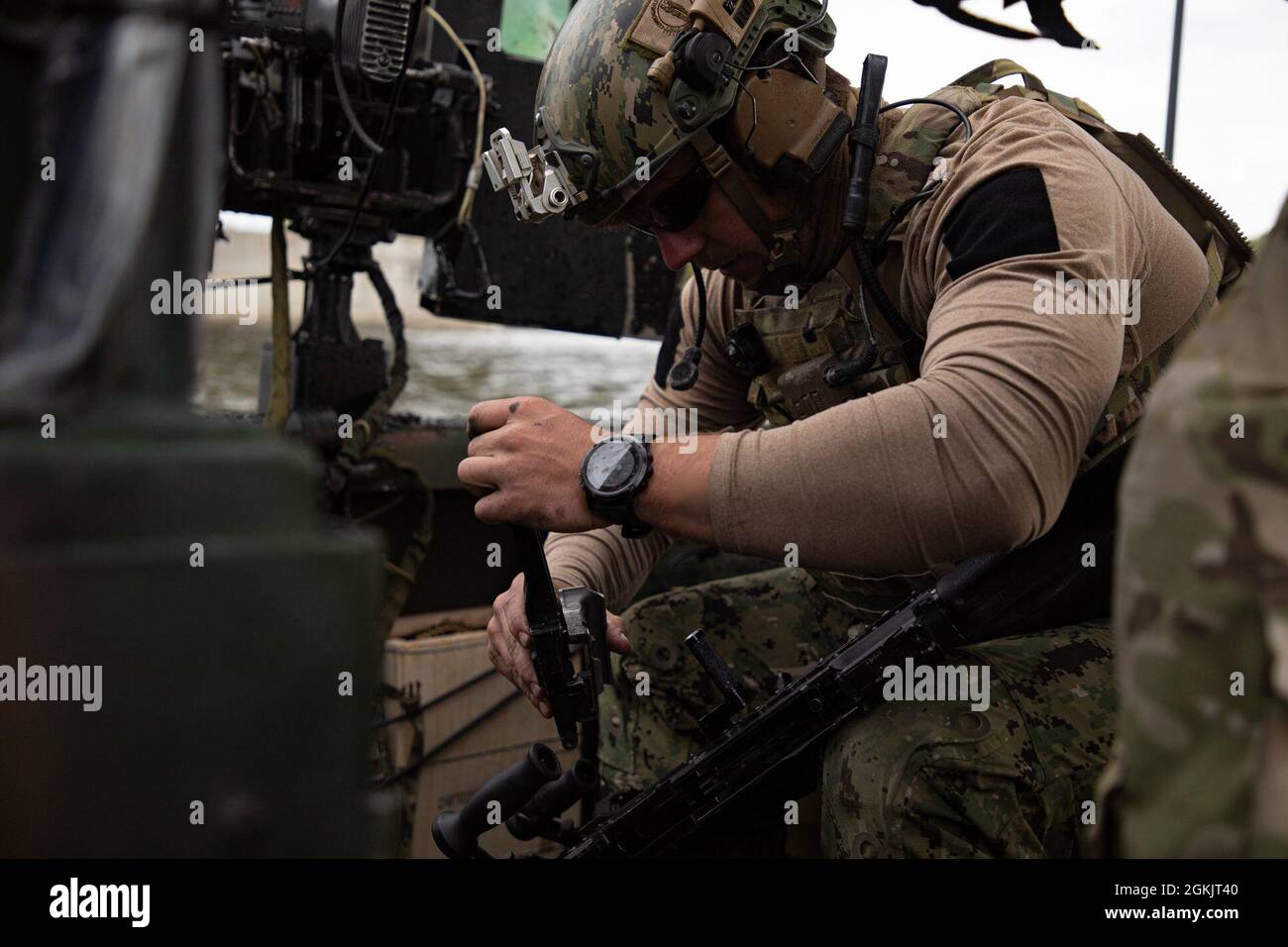 A Naval Special Warfare operator conducts infiltration and exfiltration ...