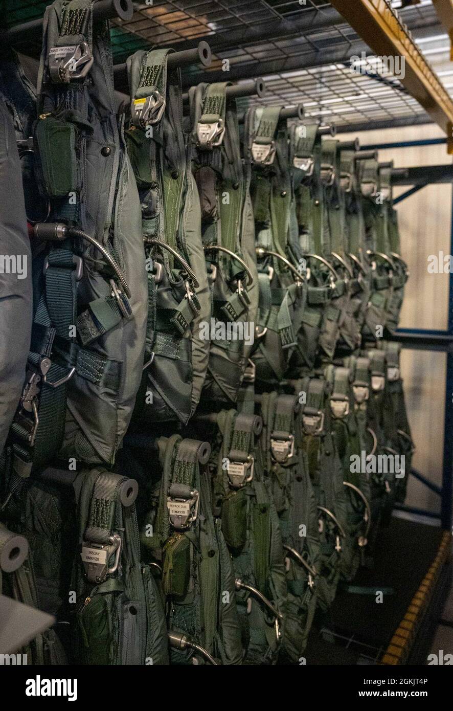 A rack of BA-22 parachutes hang at the 436th Operations Support ...