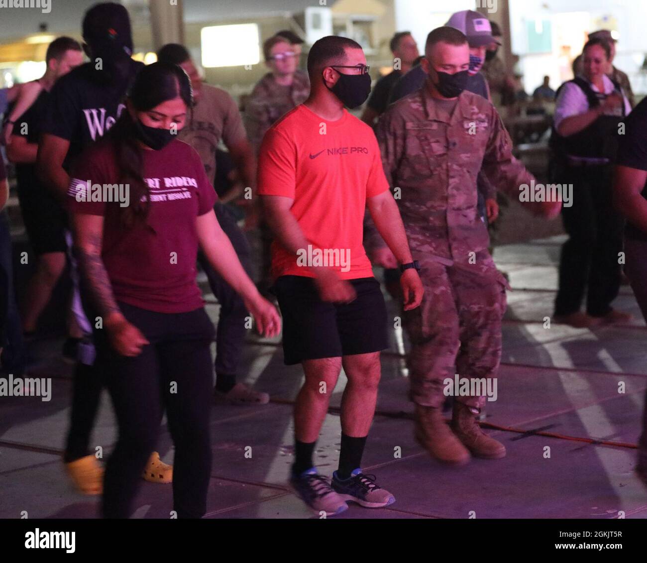 Soldiers, contractors and Military Police get up and dance to the song ...