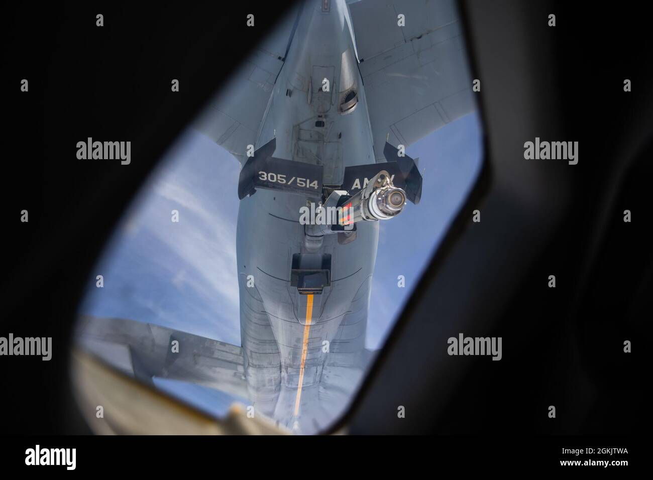 U.S. Air Force aircraft conduct an in-flight refuel operation while en ...