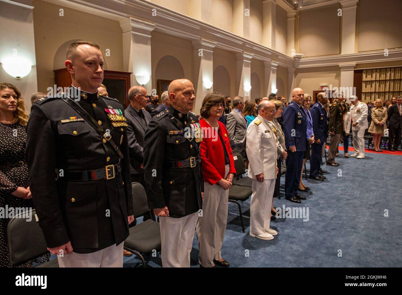 Gen. David H. Berger, center, 38th Commandant of the Marine Corps, and ...