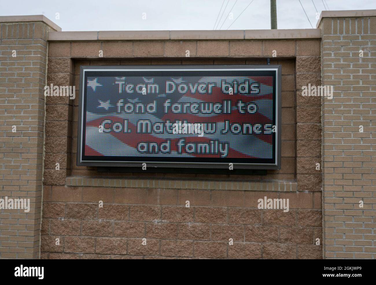 A base marquee displays a farewell message to Col. Matthew Jones, 436th ...