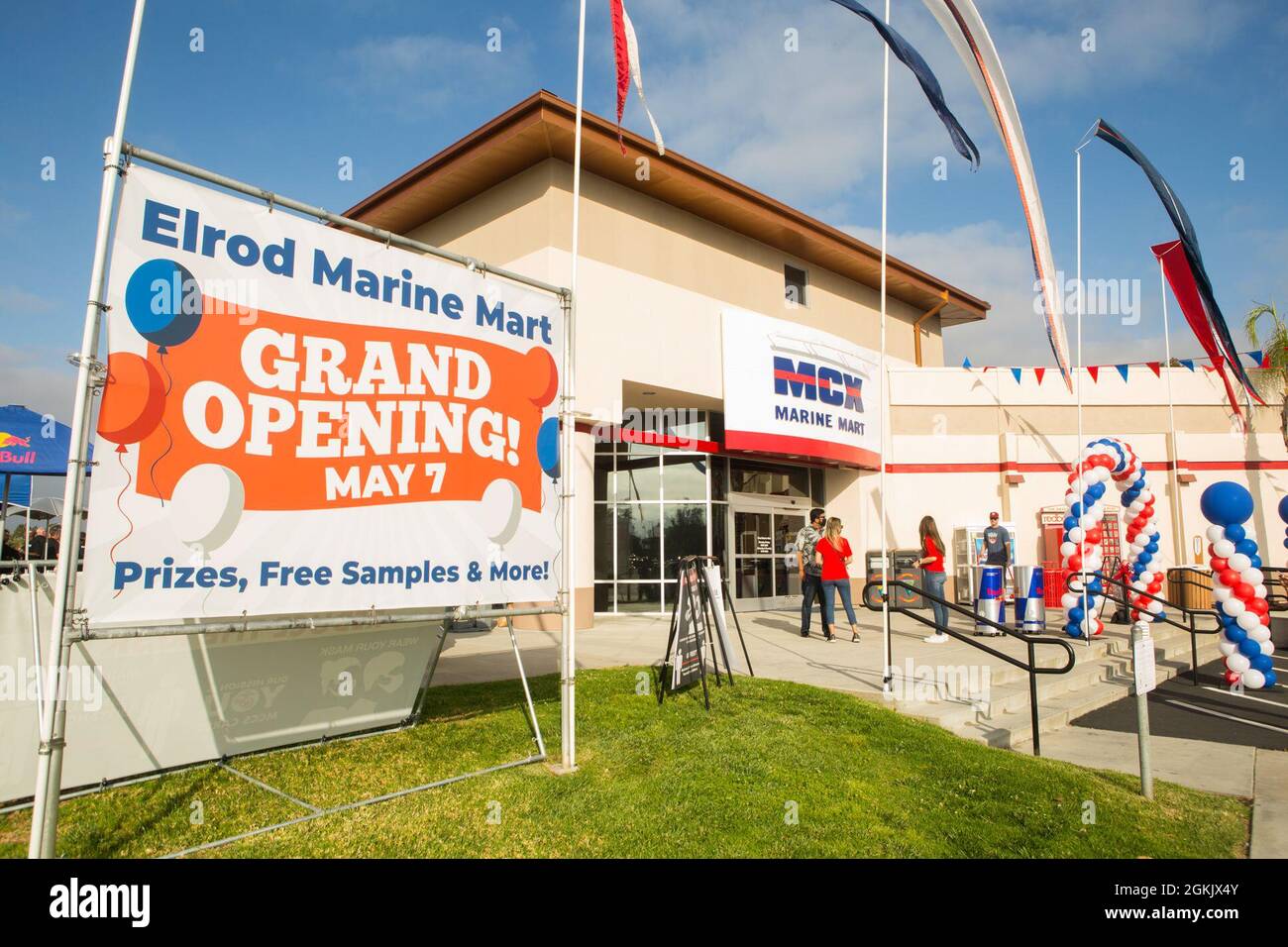 U.S. service members and civilians attend the grand reopening of Elrod Avenue Marine Mart on ...