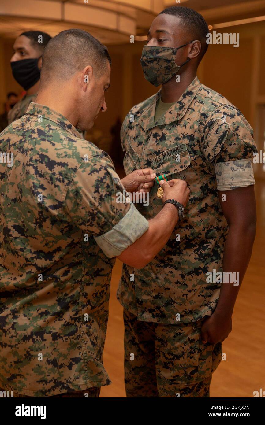 U.S. Marine Col. Paul C. Merida, left, the commanding officer of the ...