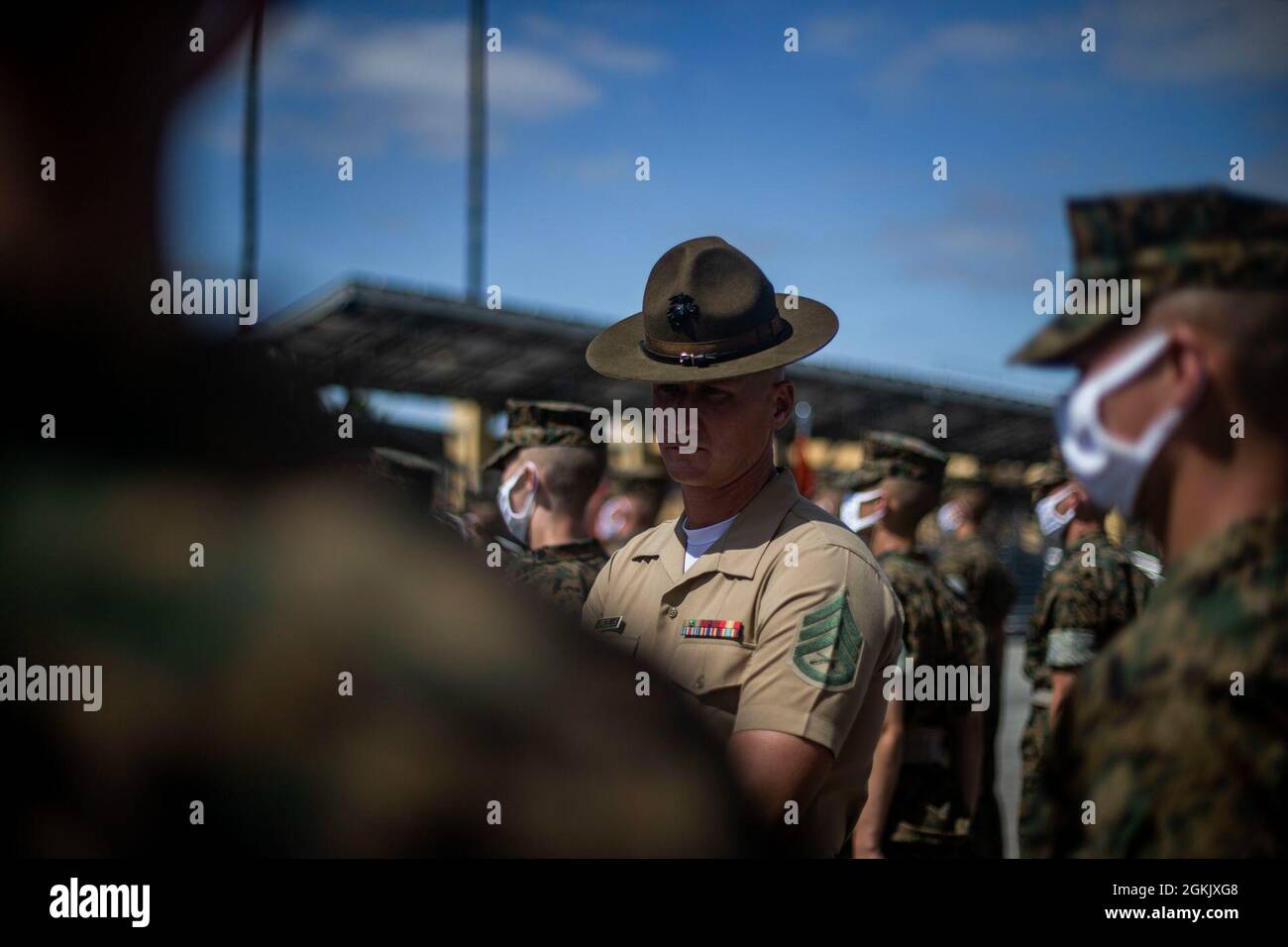 A recruit at Marine Corps Recruit Depot, San Diego (MCRD), stands in ...