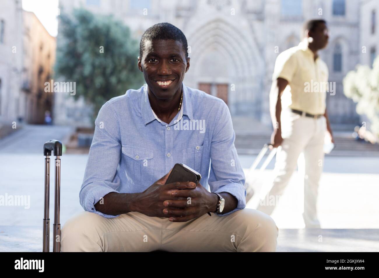 Portrait of african american enjoying walk through city in day Stock ...