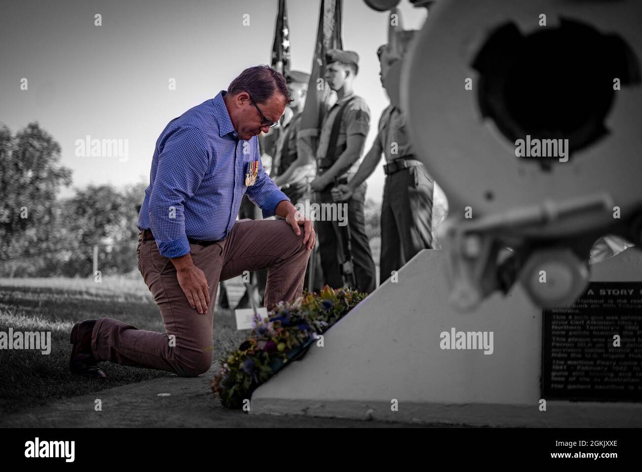 Luke Gosling, Australian Federal Member for Solomon, lays a wreath at ...