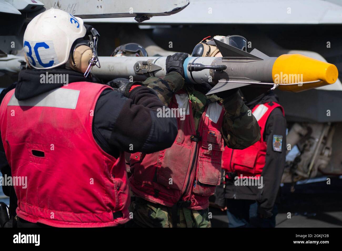 U.S. Navy Sailors, assigned to the “Blue Diamonds” of Strike Fighter ...