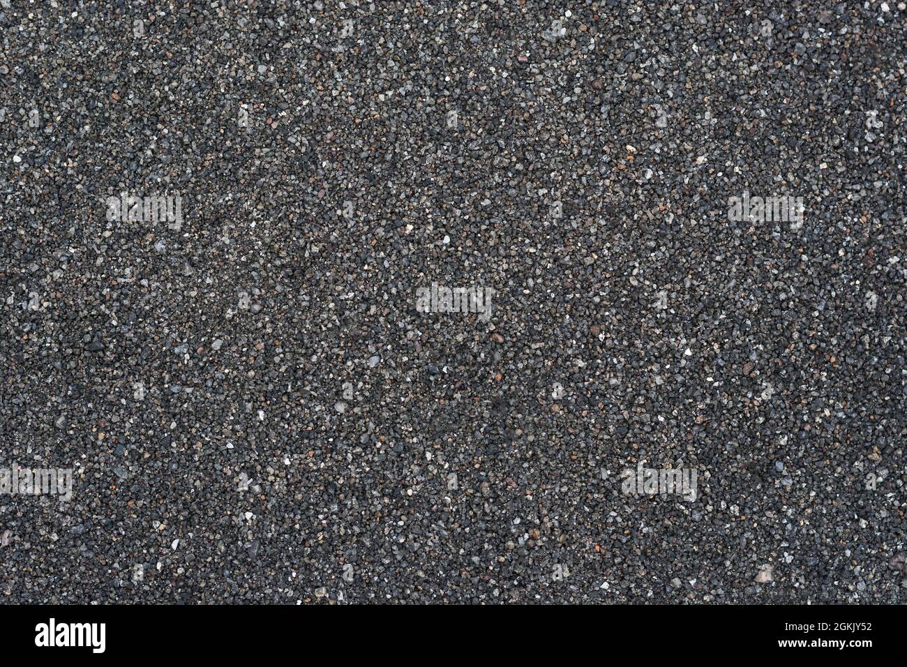 small stones pebbles, gravel rocks background texture, dark gray and ...