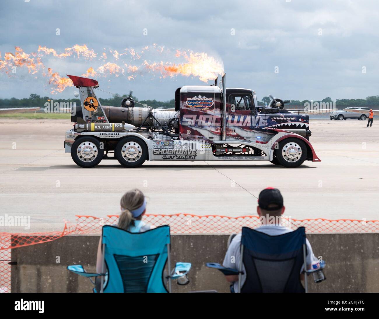 Spectators watch as the Shockwave Jet Truck performs a demonstration at ...