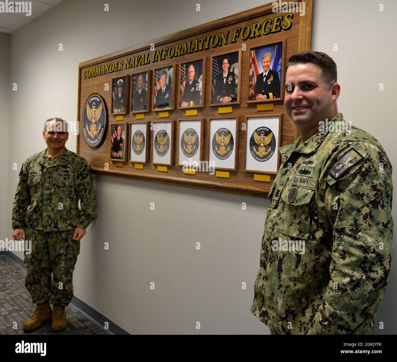 Vice Adm. Brown, Commander, NAVIFOR and NAVIFOR FORCM Twiford flank the ...
