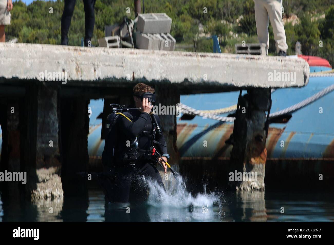 U.S. Army Sgt. Timothy Sparks from the 86th Engineer Dive Detachment ...