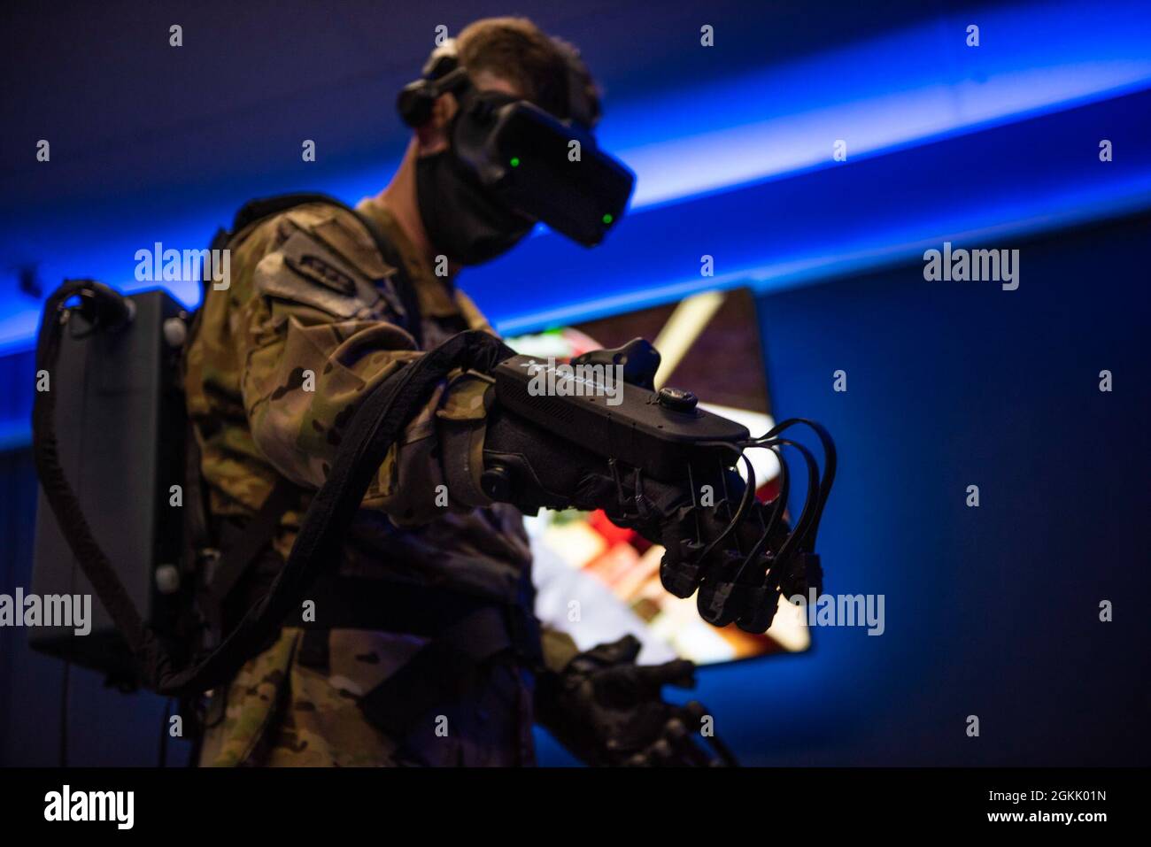 Col. James Young, 317th Airlift Wing commander, tests HaptX Gloves ...