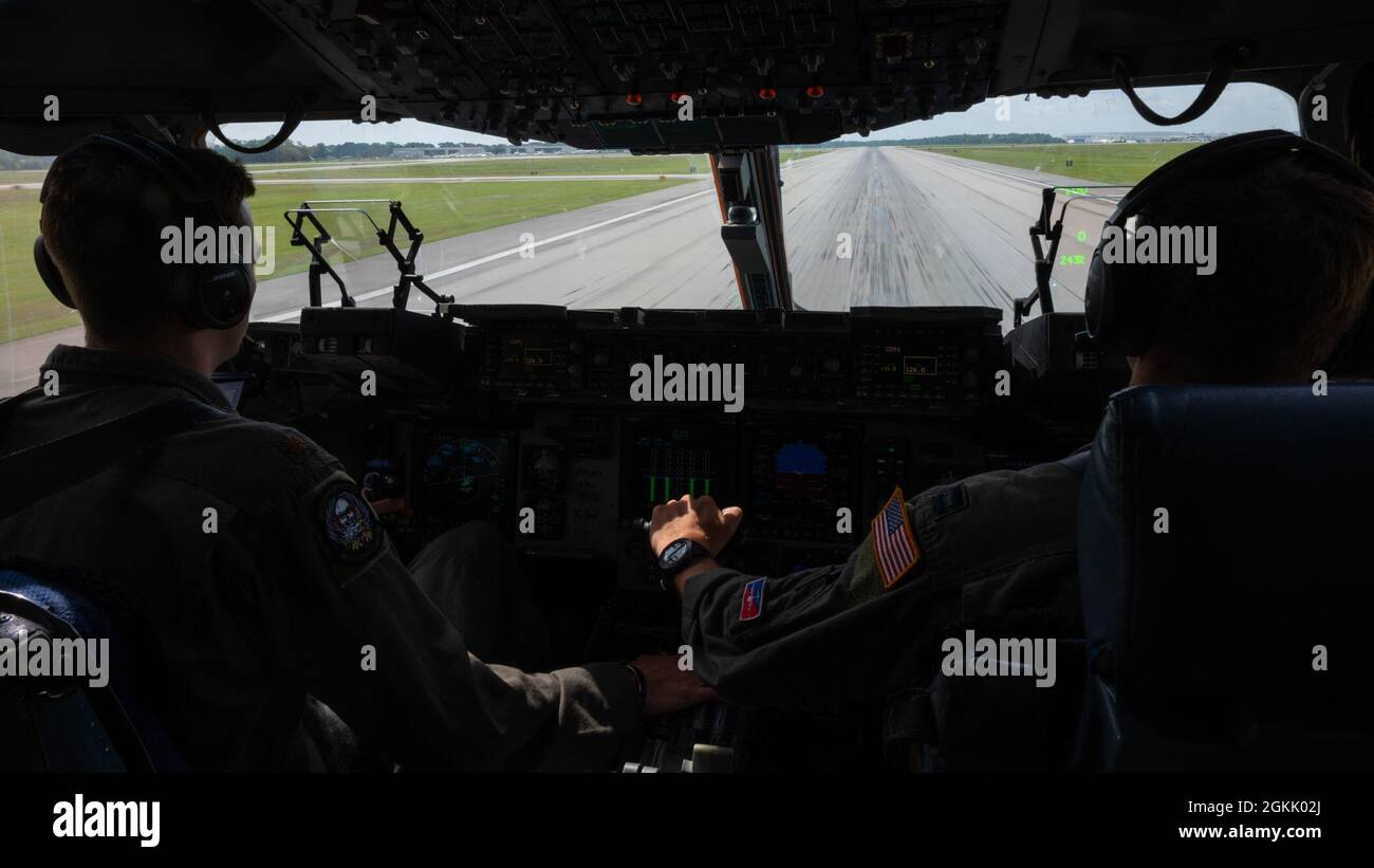 U.S. Air Force Maj. Ryan Versen, left, an instructor pilot assigned to ...