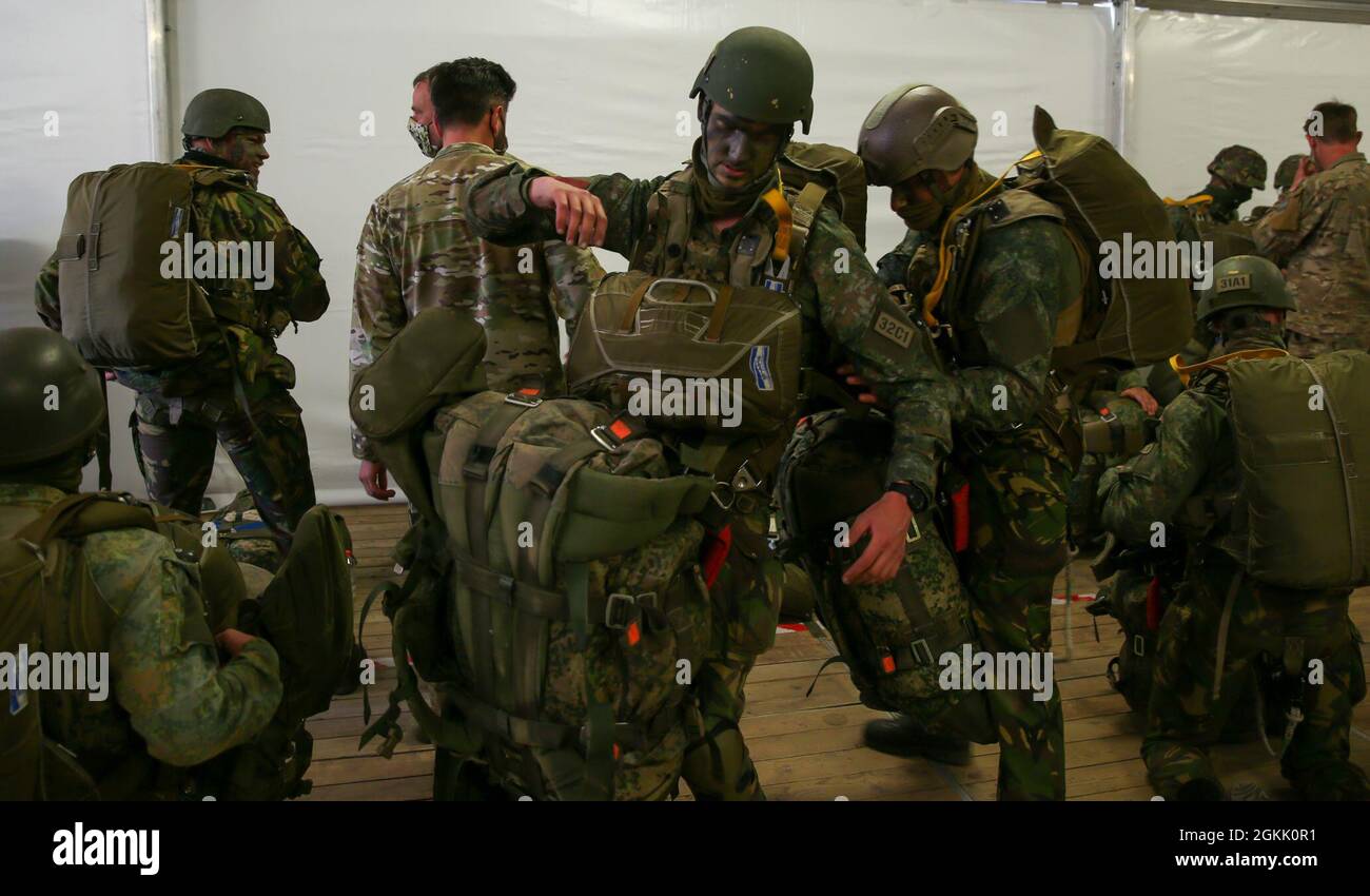 Netherlands soldiers assigned to 11th Airborne Battalion buddy assist ...