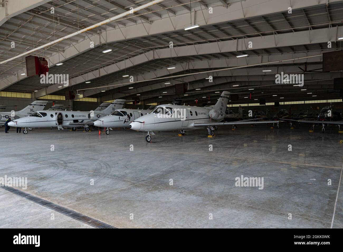 Aircraft being moved to a hardened shelter to protect them from severe ...