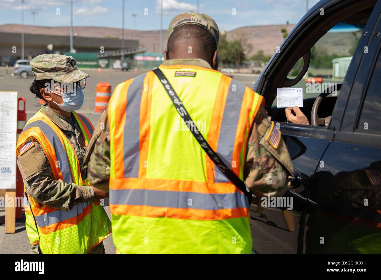 U.S. Army 1st Lt. Maria Ong, left, a medical-surgical nurse deployed ...