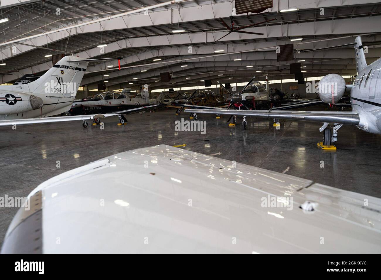 Aircraft being moved to a hardened shelter to protect them from severe ...