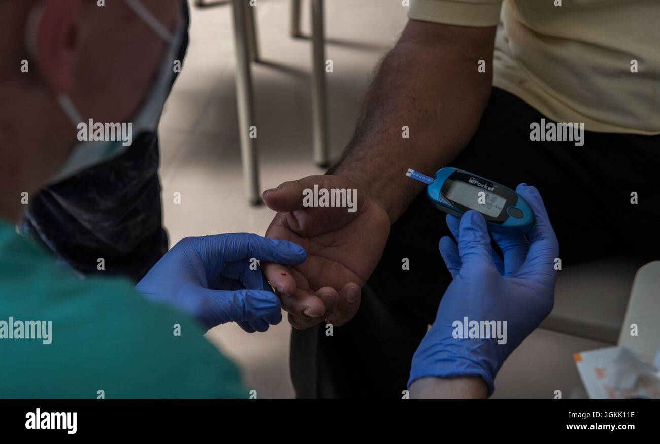 U.S. Army Spc. Joshua Monson, an emergency room medic with the Medical ...