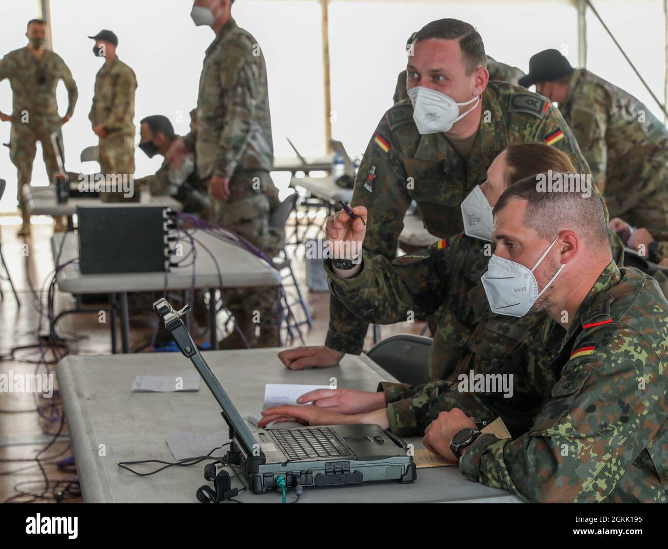 German soldiers discuss tactics during the Artillery Systems ...