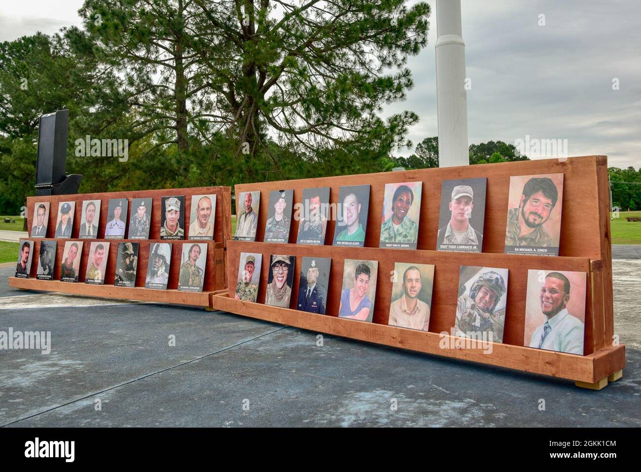 Photos of fallen law enforcement officers are displayed at the National ...