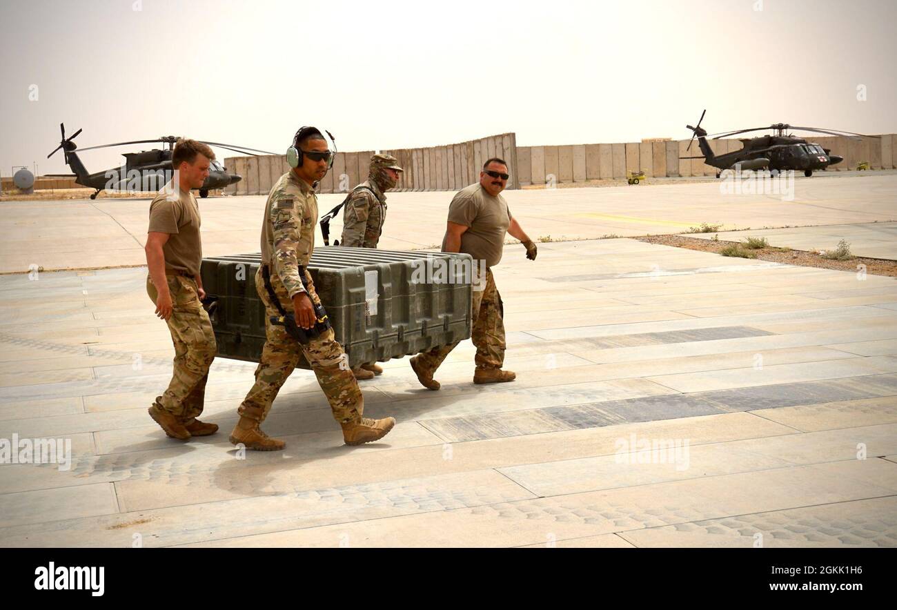 Task Force Phoenix Soldiers Sgt. Sam Loggins, Chief Warrant Officer 2 ...