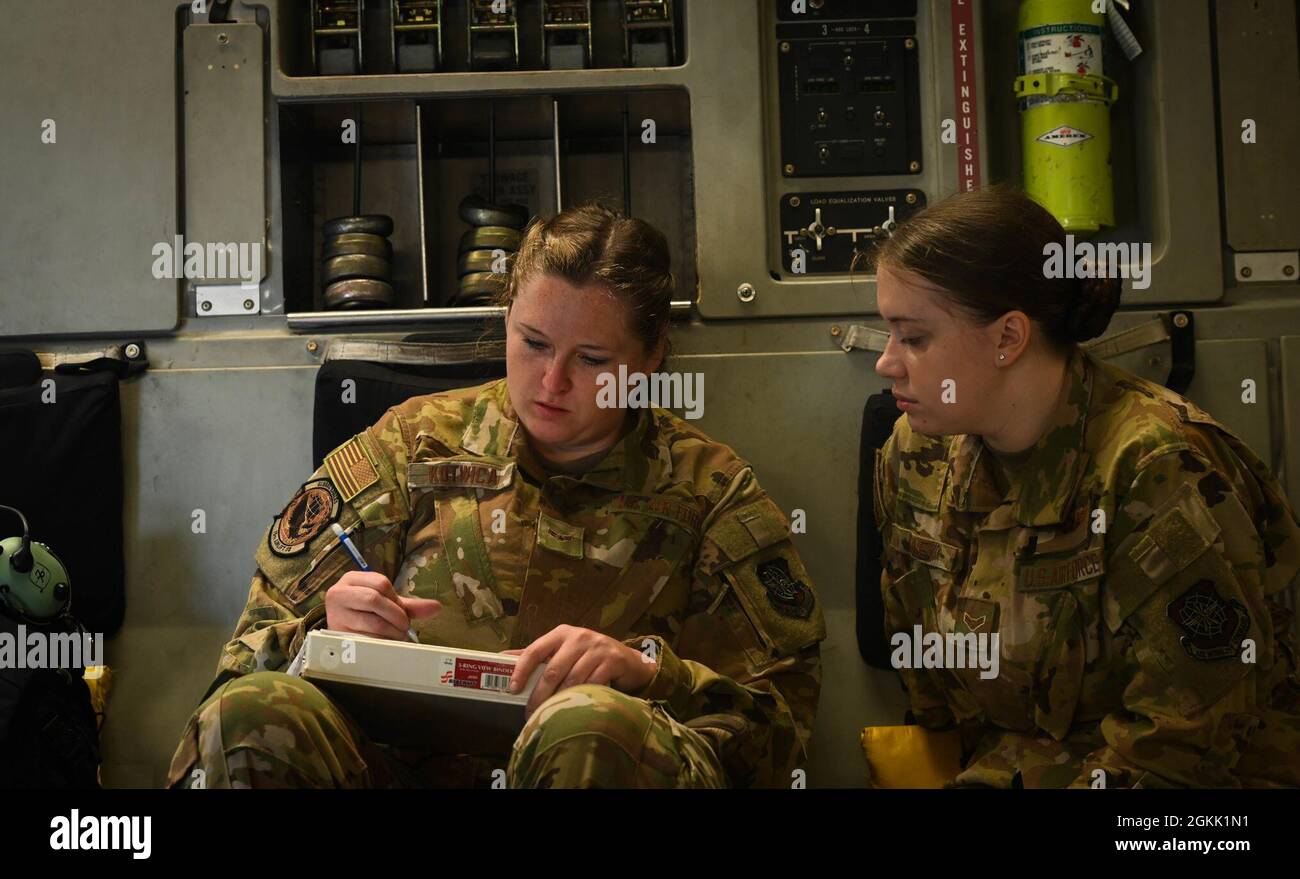 U.S. Air Force Airmen 1st Class Alyssa Oxley and Brooke Kotwica, 15th ...