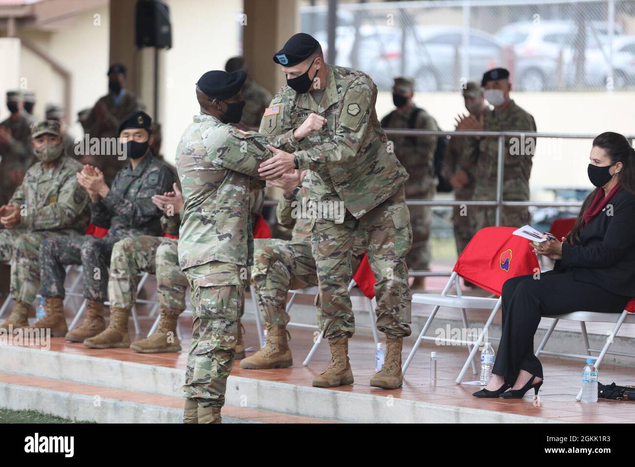 Command Sgt. Maj. LaDerek Green embraces Brig. Gen. Steven Allen ...