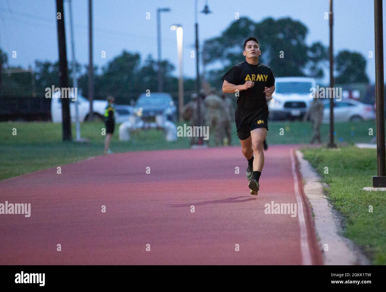 U.S. Army Drill Sgt. Aaron Angulo runs during the two mile event of the ...