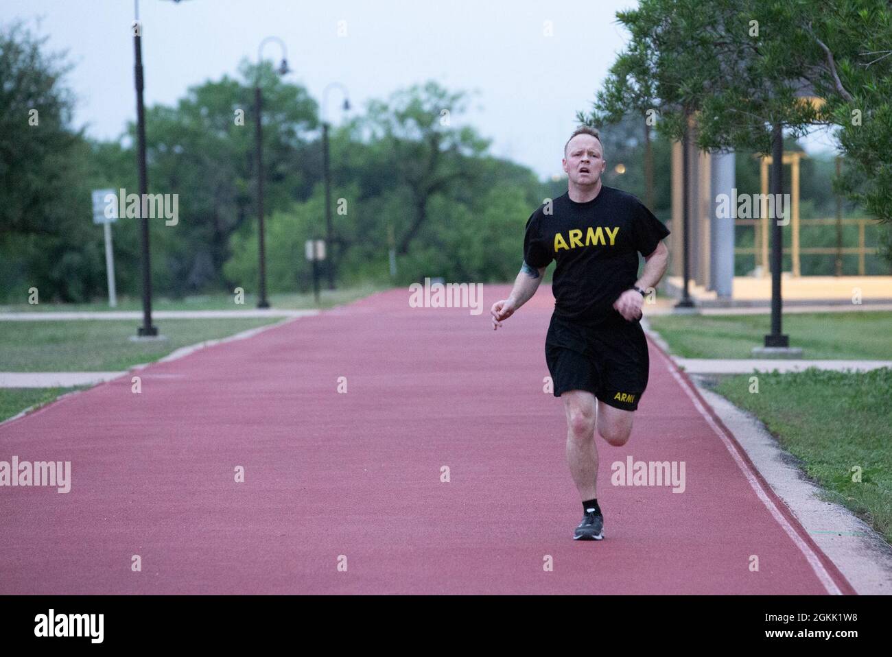A U.S. Army Soldier completes the two mile run event of the Army Combat ...