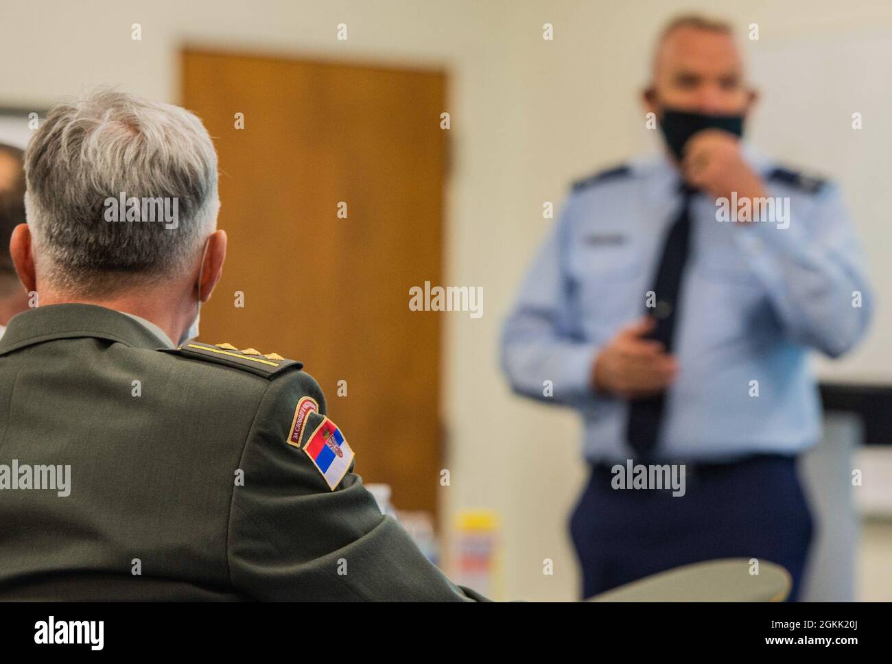 Serbian Armed Forces Col. Sasa Milutinovic, Serbian Army orthodox chaplain, listens as U.S. Air ...