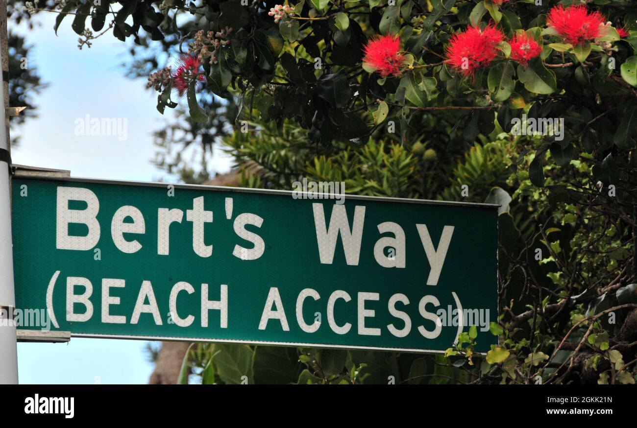 Signage acknowledging a local and local history to name a path to the ...