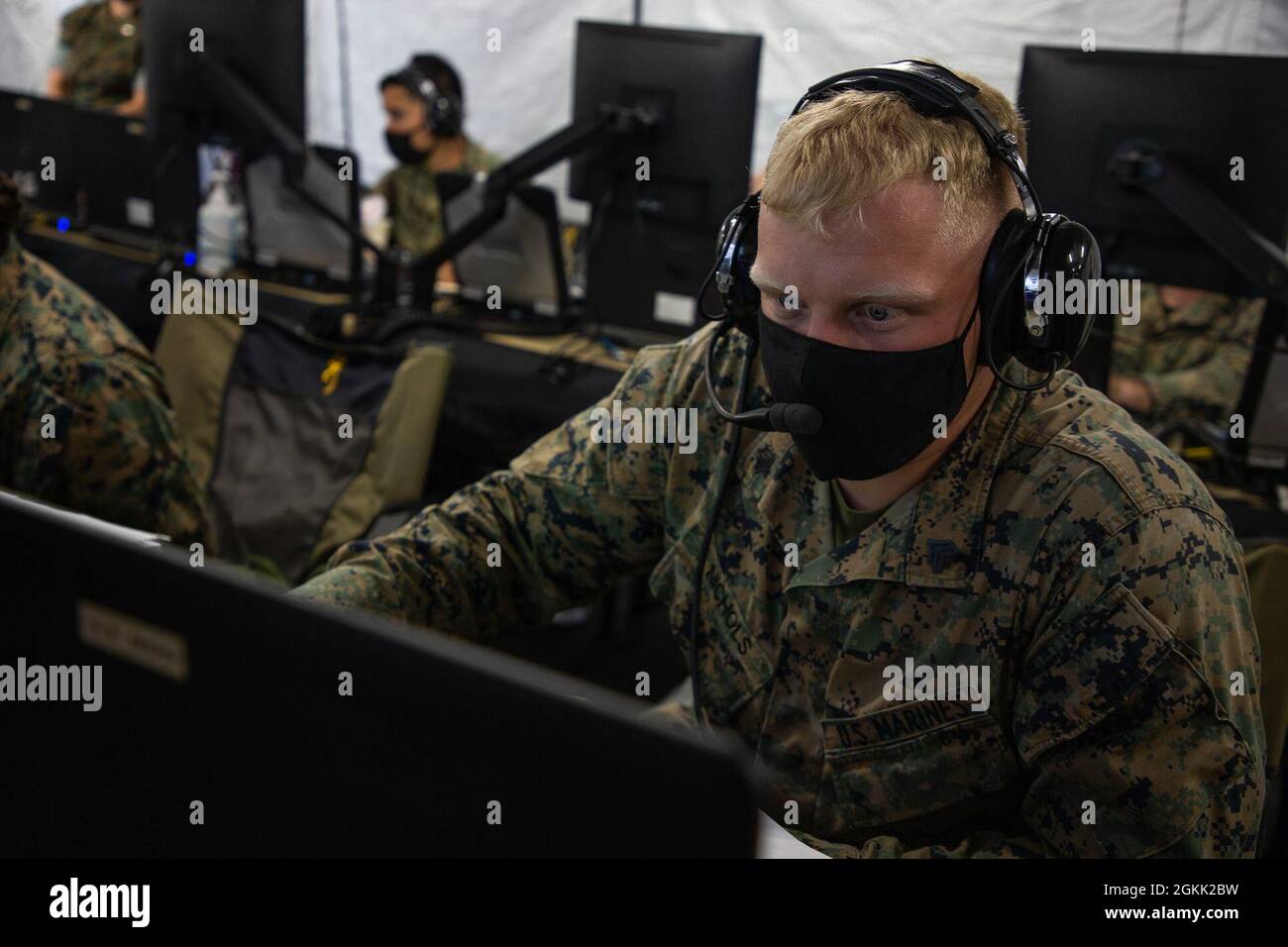 U.S. Marine Corps Sgt. Aaron Nichols, a tactical air defense controller ...