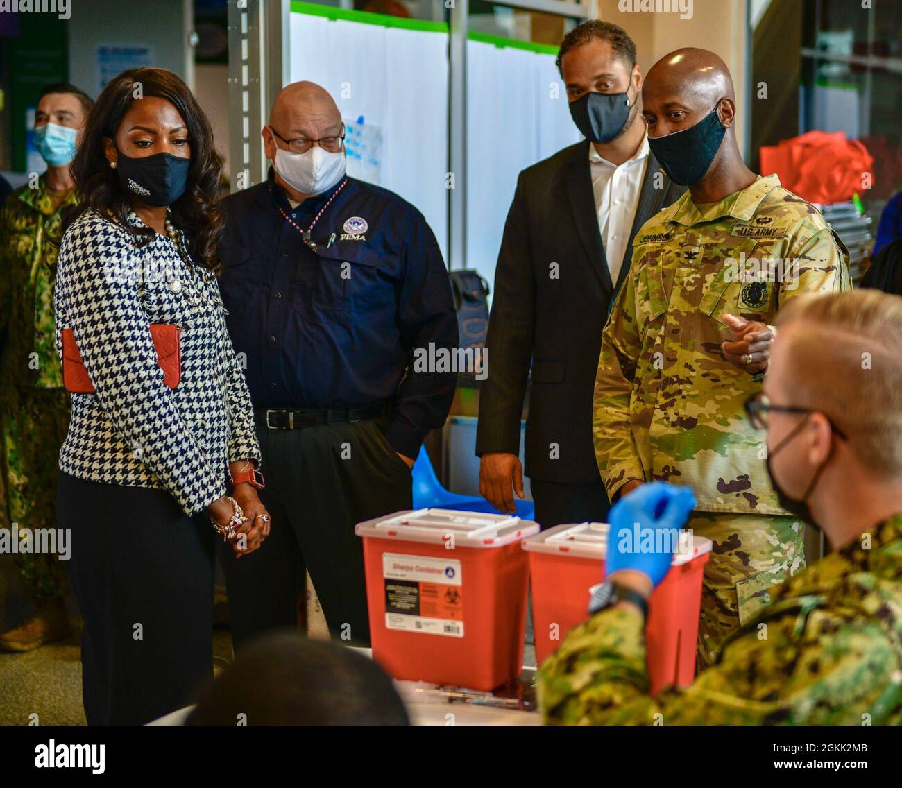 U.S. Army Col. Isaac Johnson, left, Dual-Status Title 10 deputy ...