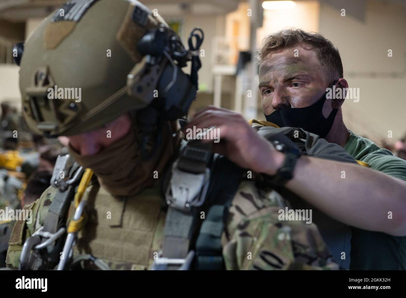 Army 1st Lt. Shane Small, right, a jumpmaster from 1st Battalion, 501st ...