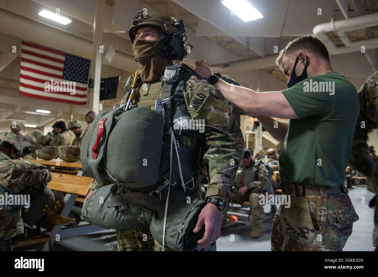 Air Force Lt. Col. Kyle Davis, left, an air mobility liaison officer ...