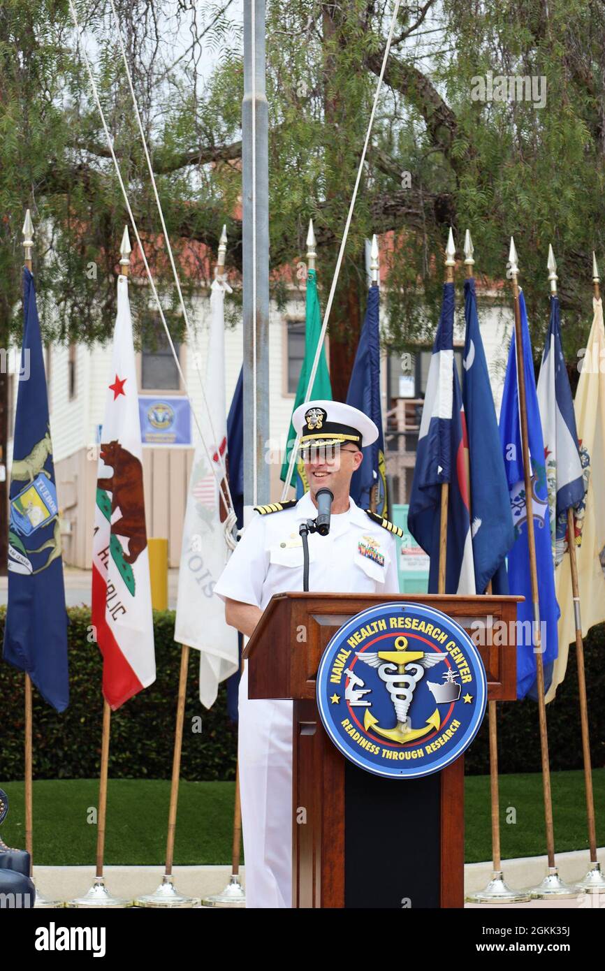 Capt. Dennis Faix addresses guests during a change of command ceremony ...