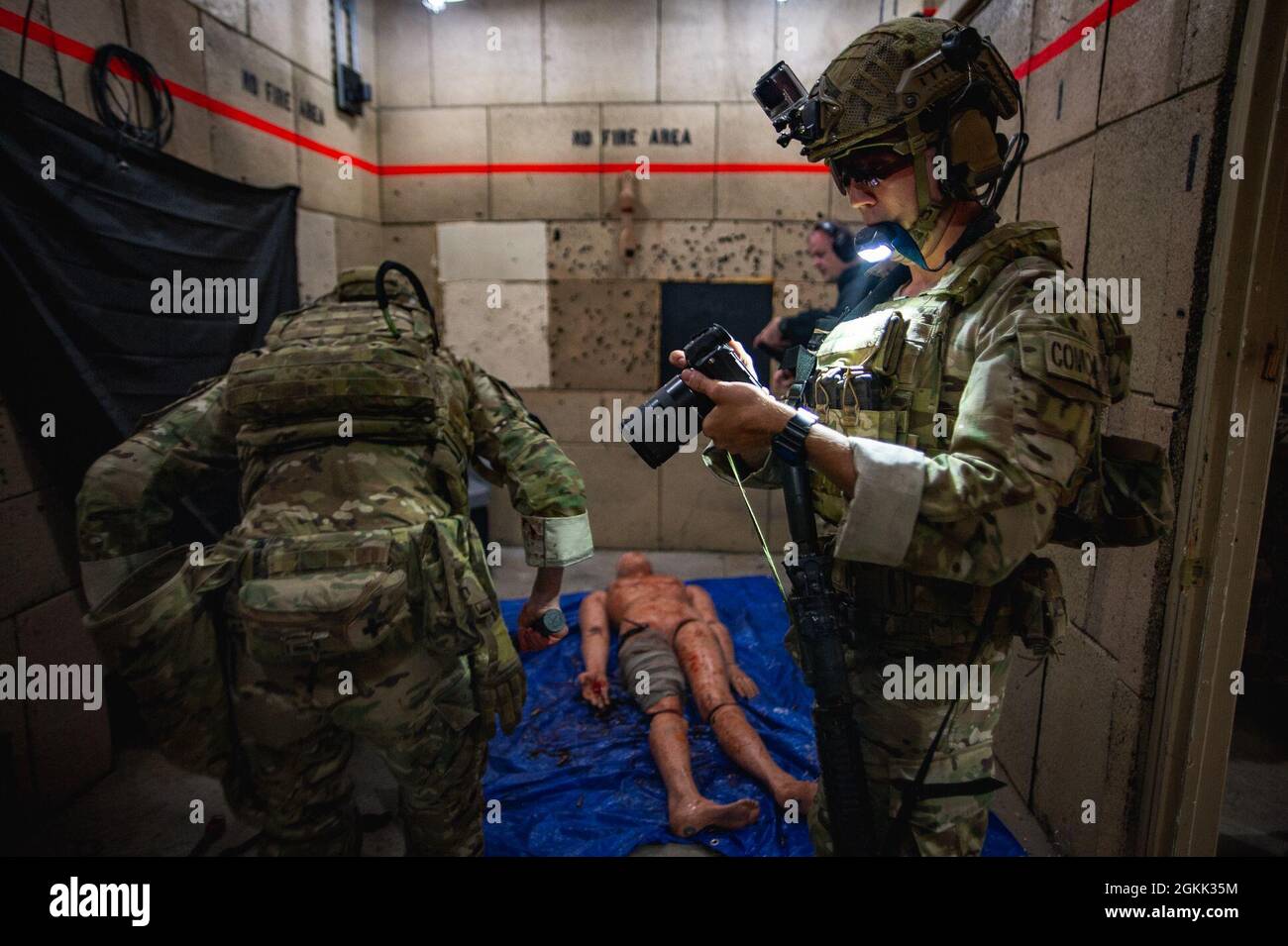 U.S. Army Spc. Landon Carter and Spc. Mitchell Gibbs, assigned to ...