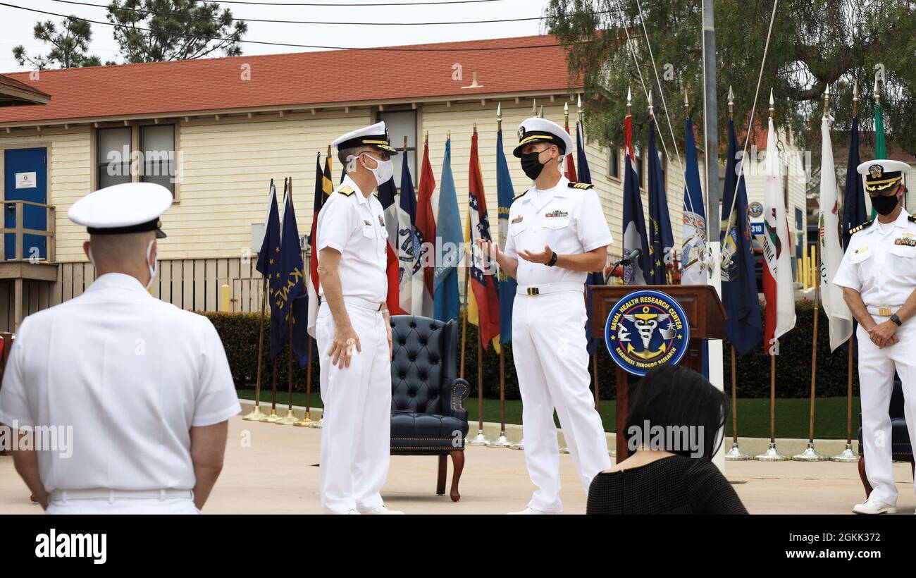 Naval Medical Forces Pacific Commander Rear Adm. Tim Weber talks with ...
