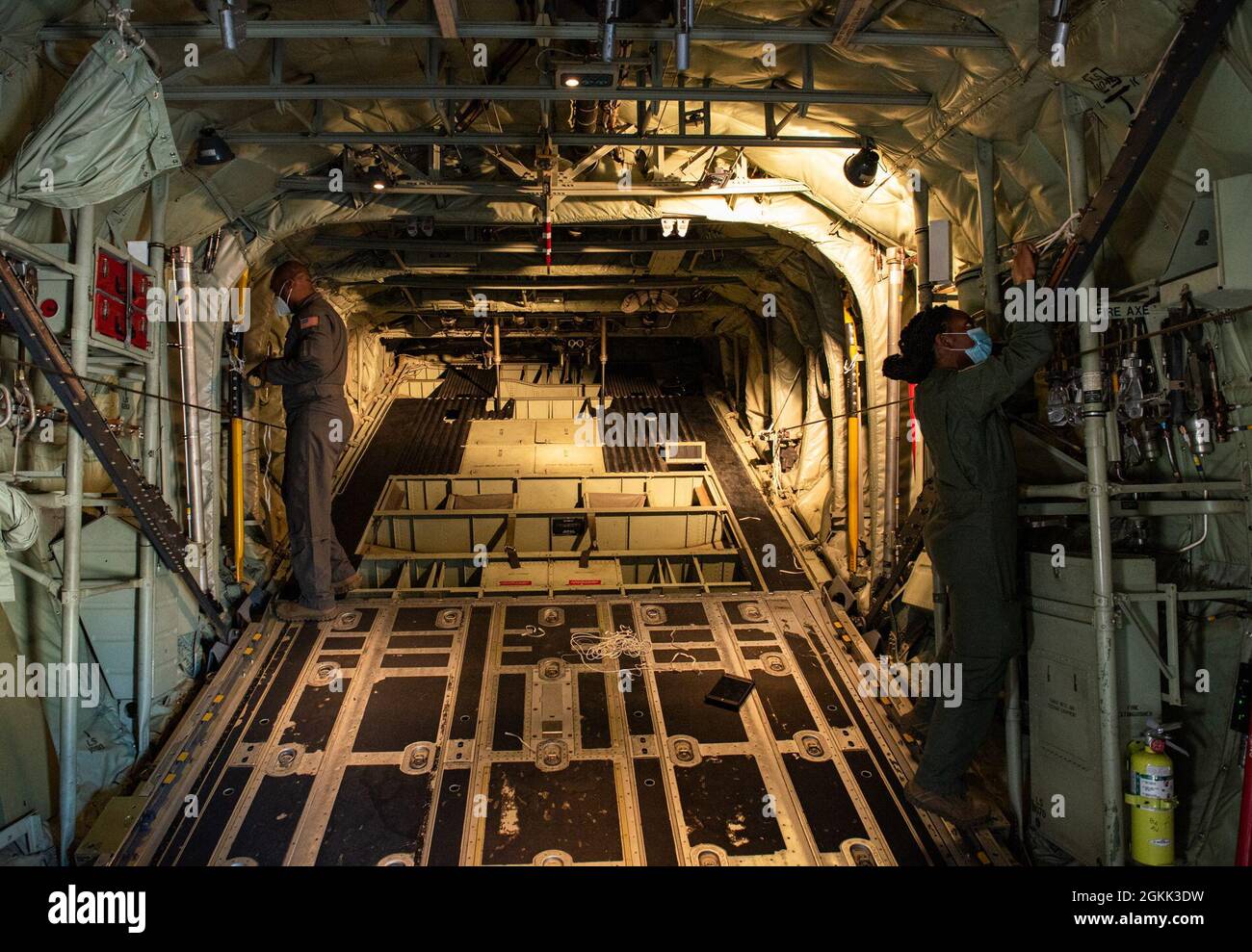 U.S. Air Force Tech. Sgt. Mario Linton, left, and Airman 1st Class ...