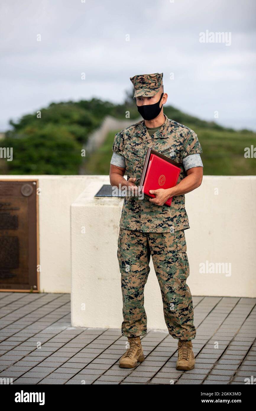 U.S. Marine Corps Chief Warrant Officer 3 Sambo Phoeuk, the temporary ...