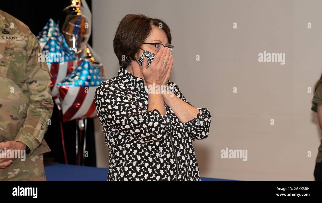Stickle shows her surprise as several of her family members appear on ...